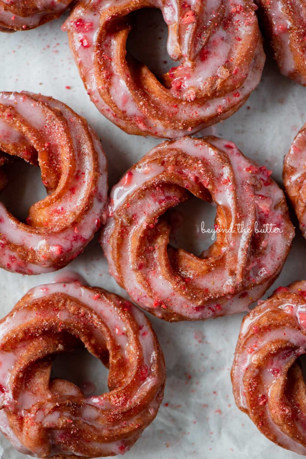 Strawberry Glazed French Crullers - Beyond the Butter